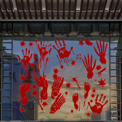 The Holiday Aisle® Bloody Handprint Footprints Window Decal | Wayfair
