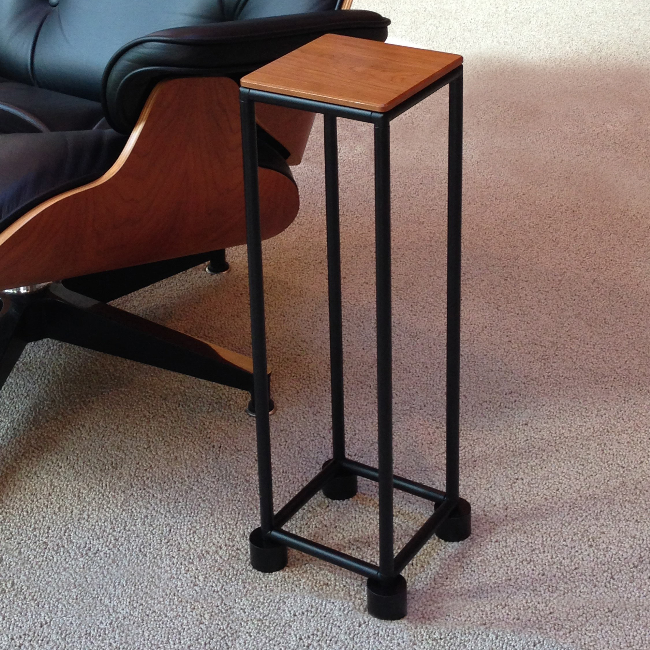 Ebern Designs Holmestrand 25'' Tall Solid Wood Wheel End Table ...