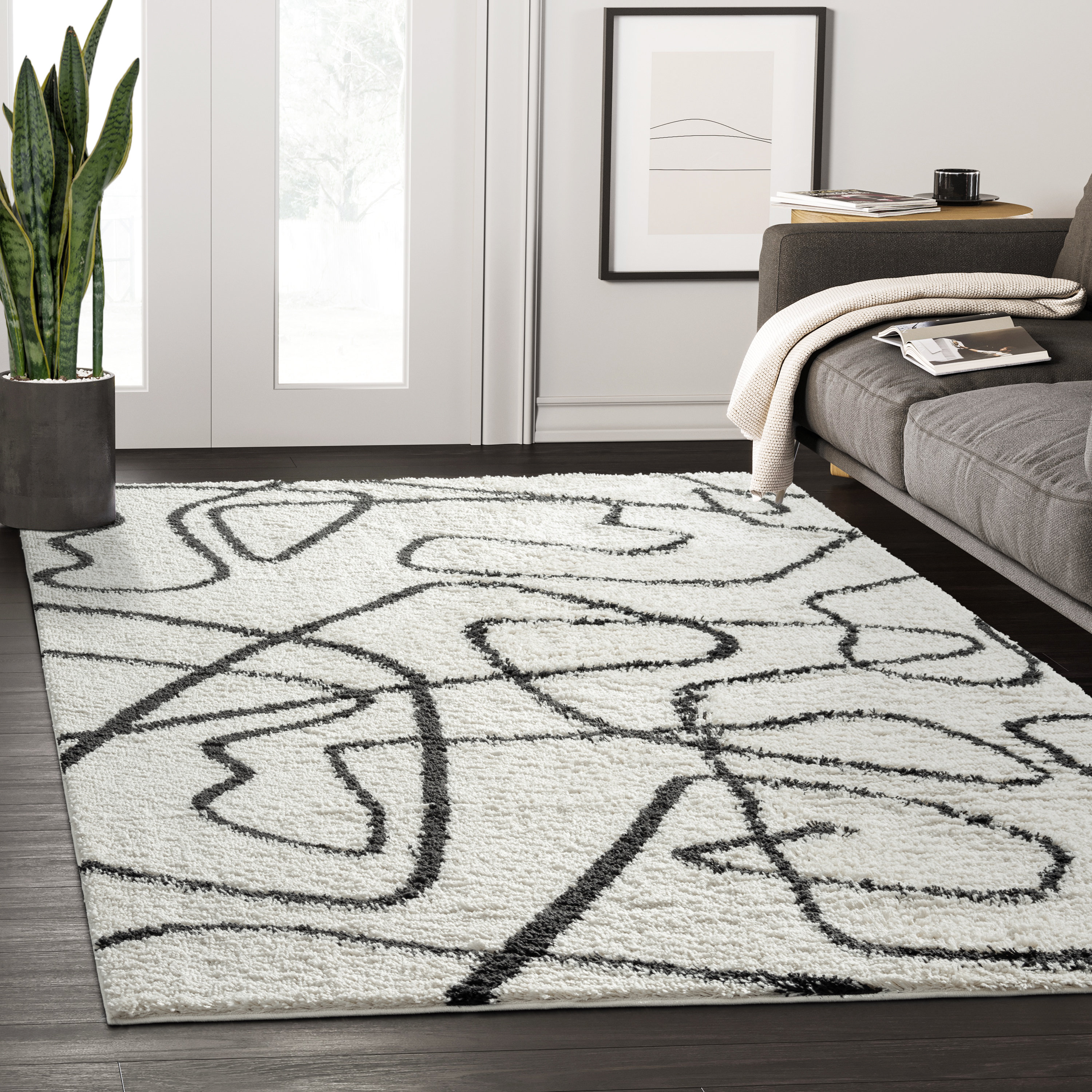 Ivy Bronx Kituku Abstract Ivory And Black Area Rug & Reviews | Wayfair