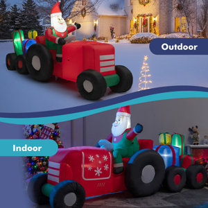 The Holiday Aisle® Santa Claus Driving Tractor Inflatable | Wayfair