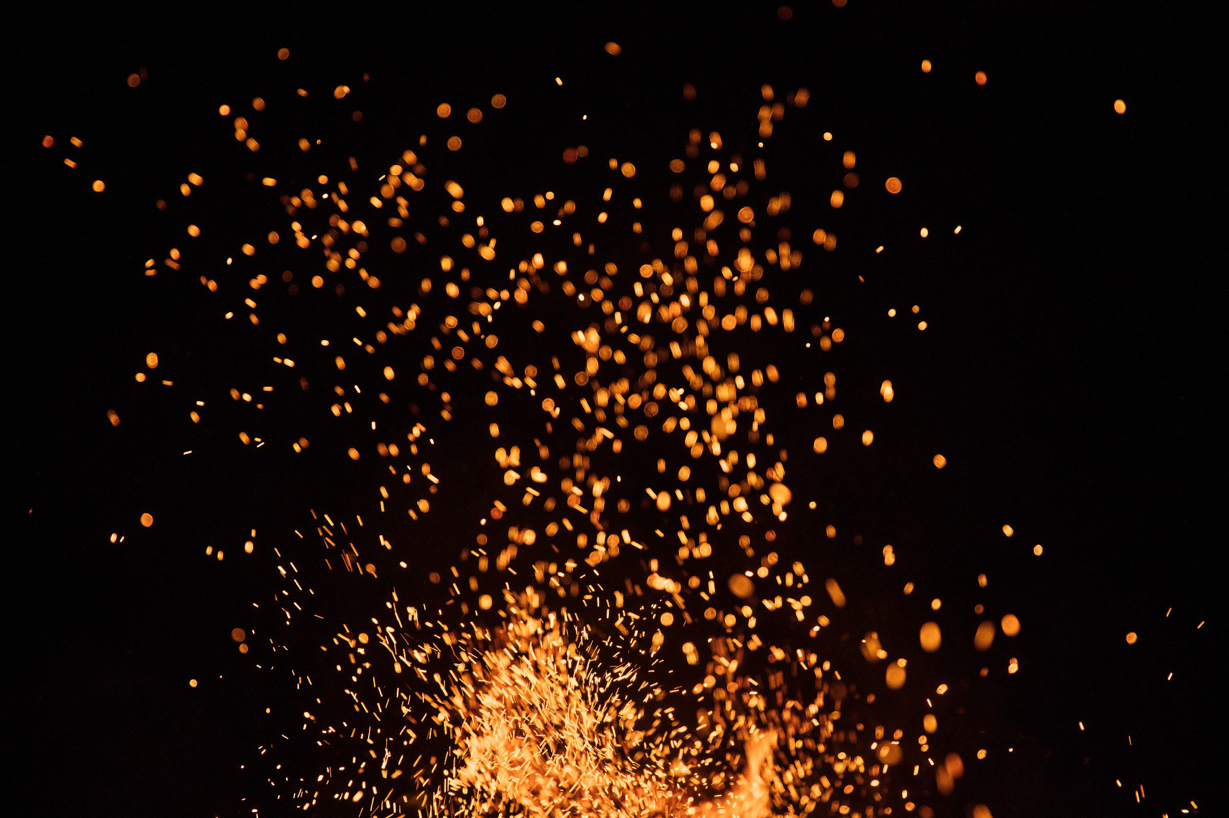 Ebern Designs Burning Sparks Flying by - Wrapped Canvas Photograph ...